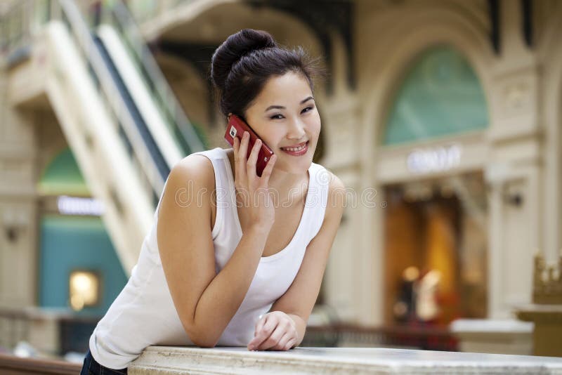 Beautiful Asian Calling by Mobile Phone Stock Photo - Image of outdoors ...