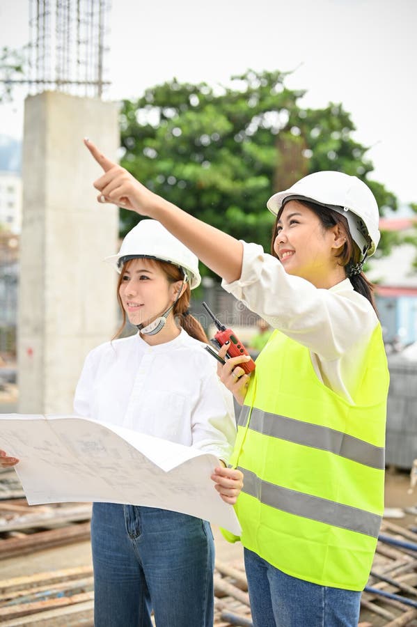 Beautiful Asian Female Engineer and Female Architect at the ...