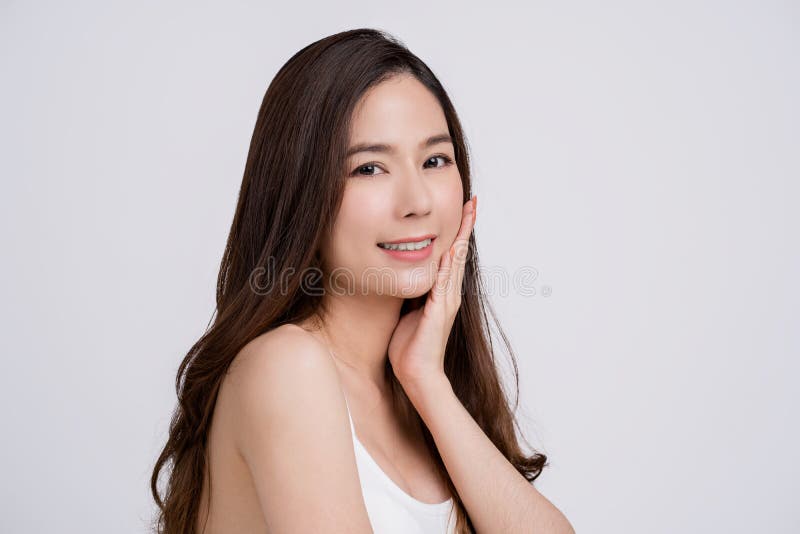 Beautiful Asian Girl With Fresh Clean Skin Touching Her Face Facials