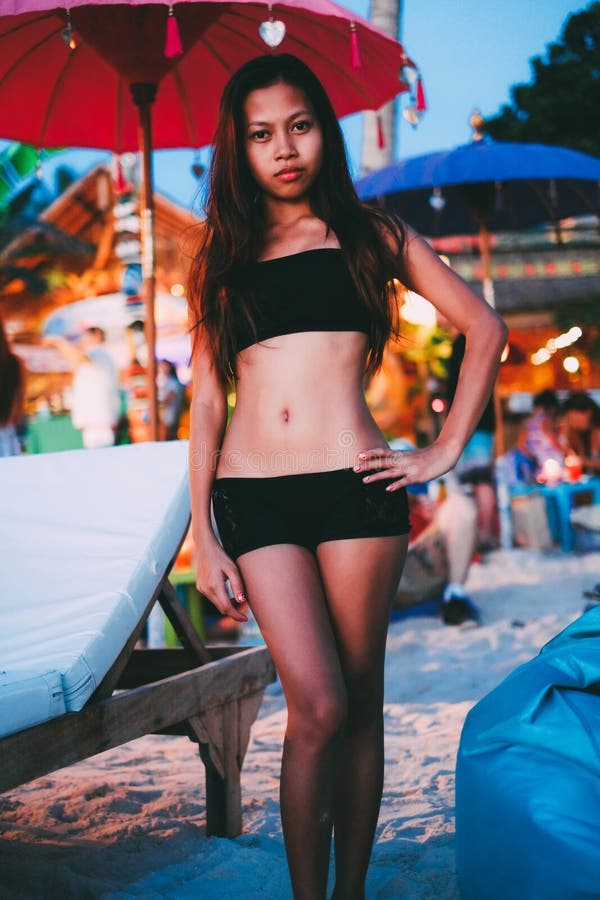 Beautiful Asian Girl Having Vacation Party On The Beach In Asia Stock