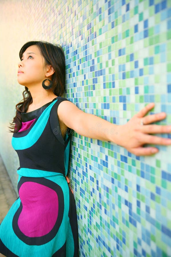 Beautiful Asian Girl Lean Back on Blue Wall Stock Image - Image of ...