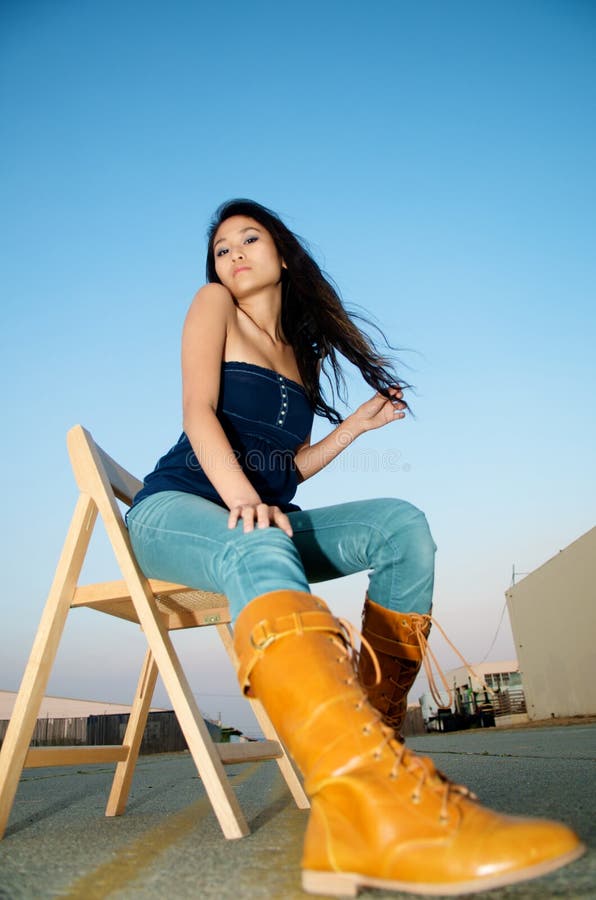 Beautiful Asian Model on Chair Stock Image - Image of american, blue ...