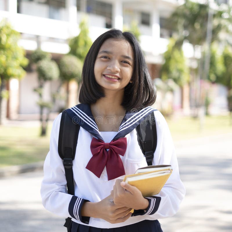 Beautiful Asian Student Hold Book at School Stock Photo - Image of ...