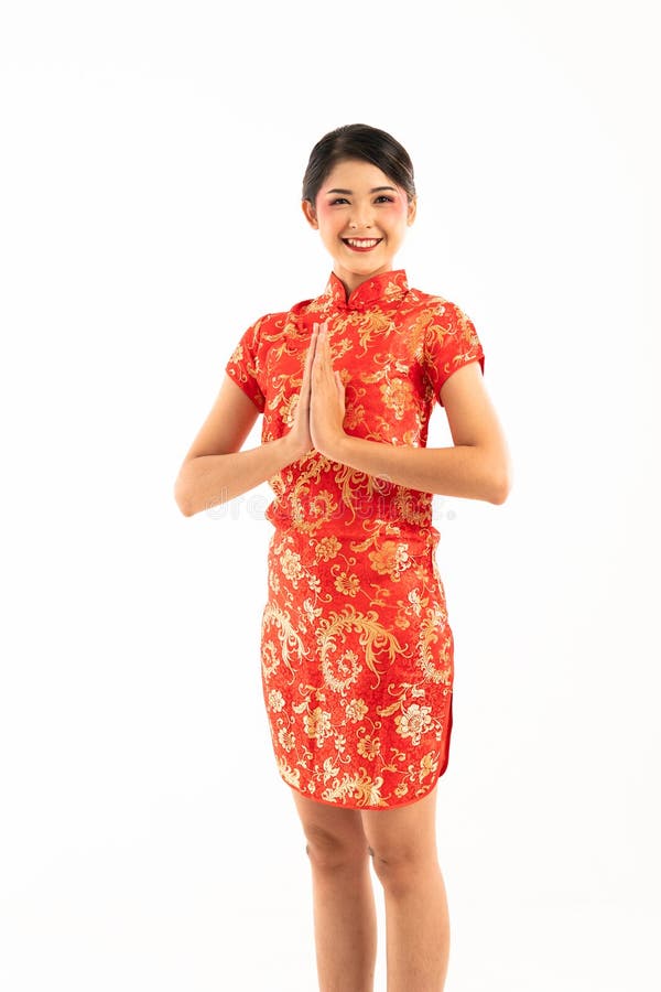Beautiful Asian Woman In Red Cheongsam Standing Put Hands Together
