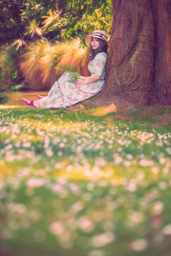 Beautiful Asian Woman Sitting Under the Tree in the Park Stock Photo ...