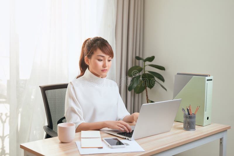 Beautiful Asian Woman Working with Computer at Home As a Freelancer ...