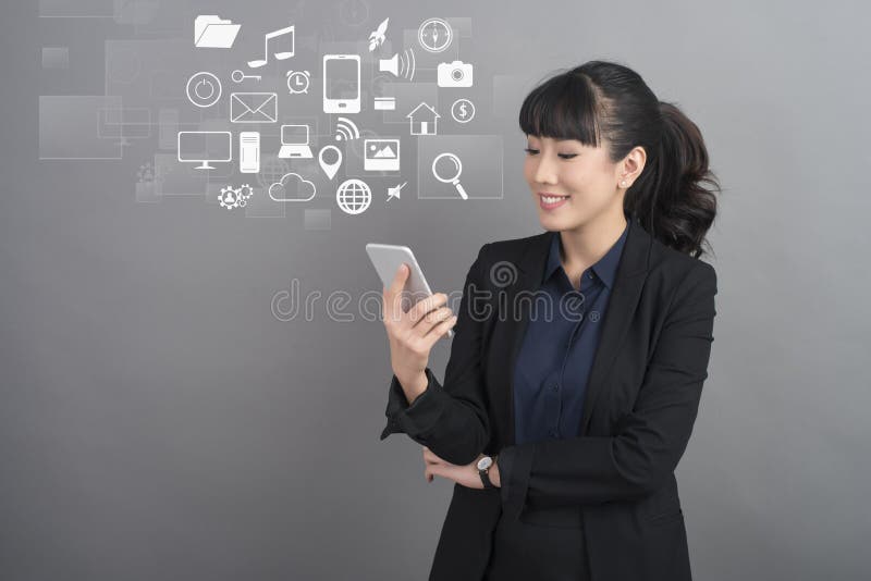 Beautiful Asian Women Using Smart Phone with Multimedia Icon ...