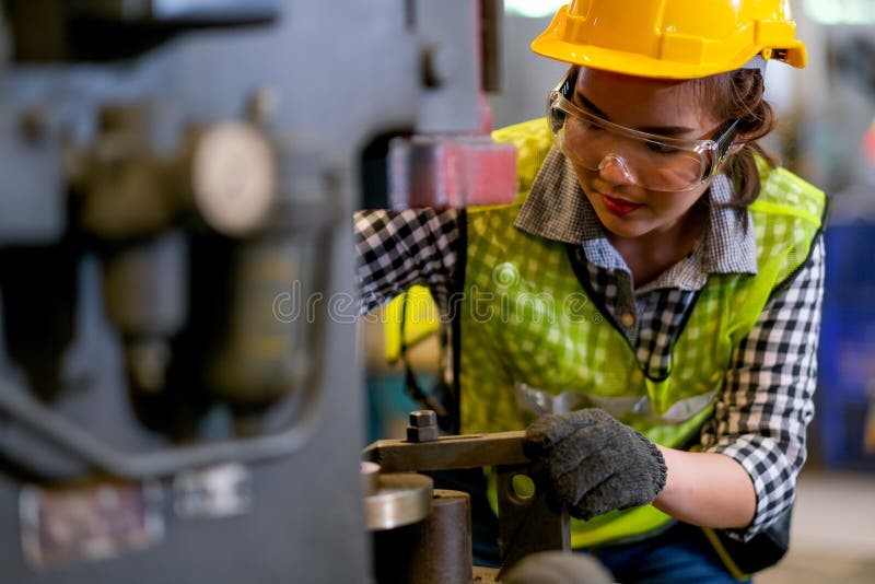Beautiful Asian Worker or Technician Woman Fix the Problem of Machine ...