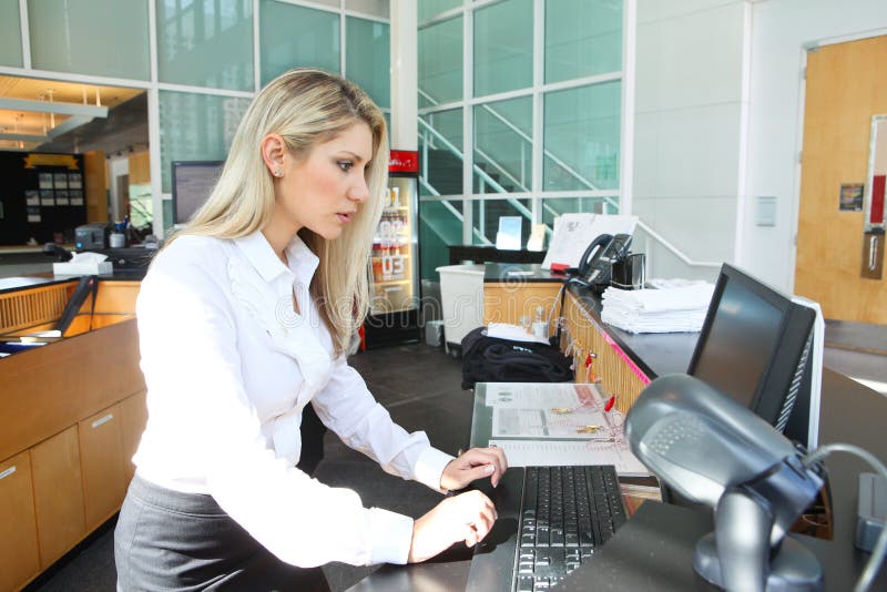 A Beautiful Assistant on Computer Stock Photo - Image of cheerful ...