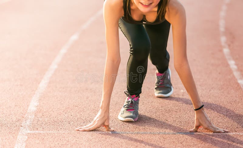 Beautiful Athlete on a Race Track is Ready To Run. Stock Image - Image ...