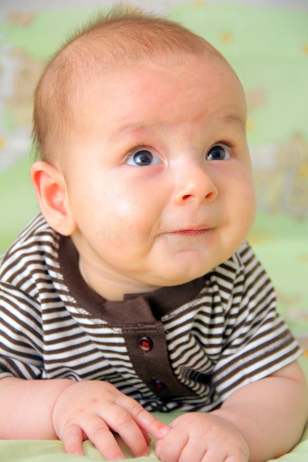A beautiful baby stock image. Image of eyes, lying, look - 27968643