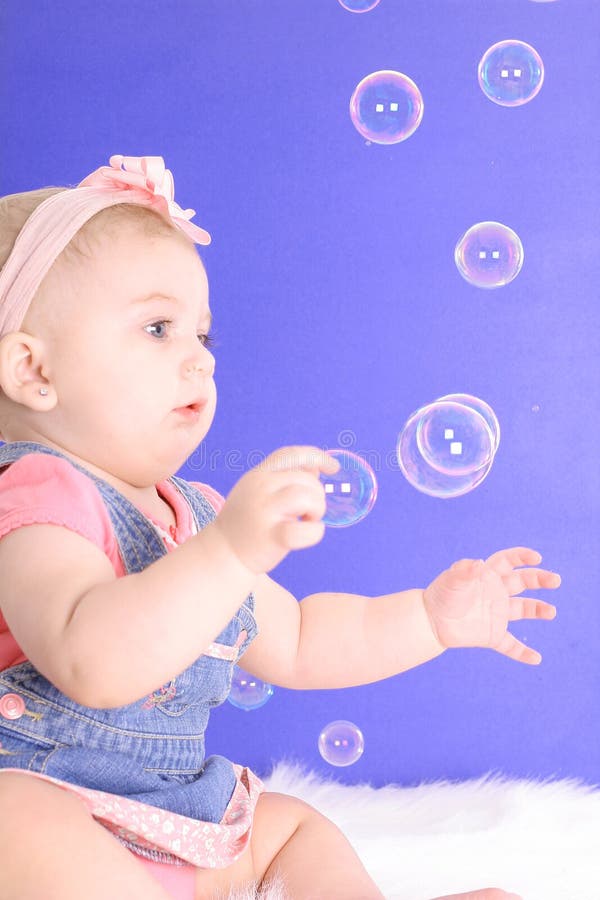 Beautiful Baby Catching Bubbles Stock Photo - Image of child, baby ...
