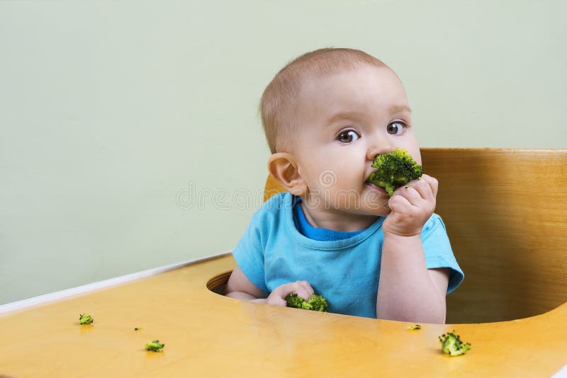 Beautiful Baby Eating Broccoli Stock Image - Image of fresh, face: 52168483