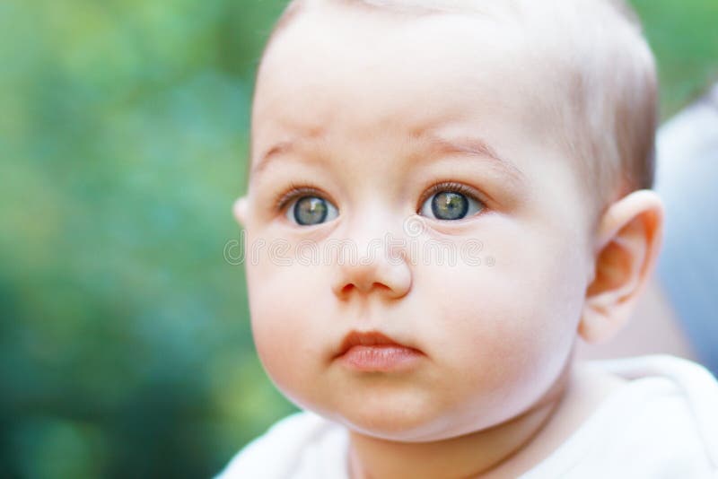 Beautiful baby making face stock photo. Image of eyes - 31056526