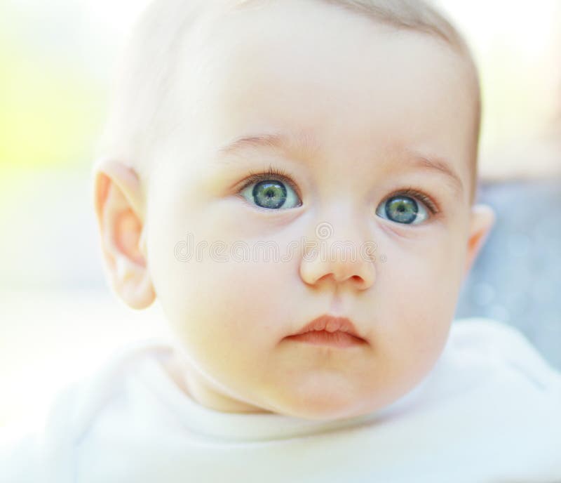 Beautiful baby making face stock photo. Image of eyes - 31056526
