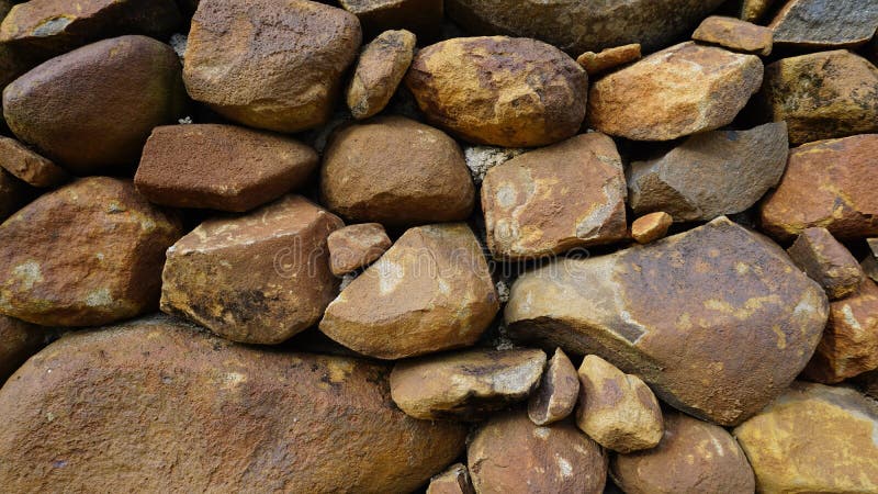Beautiful Background Pattern Image of a Wall Made of Round Stone Red ...