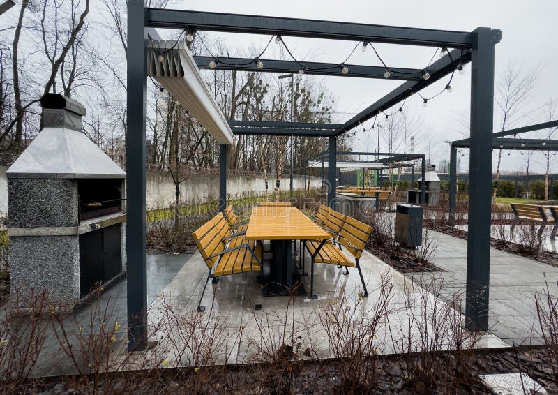 Beautiful Backyard with Barbeque Area and Dining Table Stock Photo ...