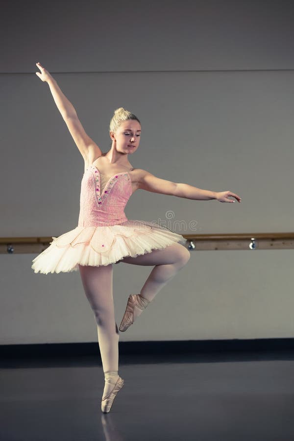 Beautiful Ballerina Dancing En Pointe Stock Image - Image of indoors ...