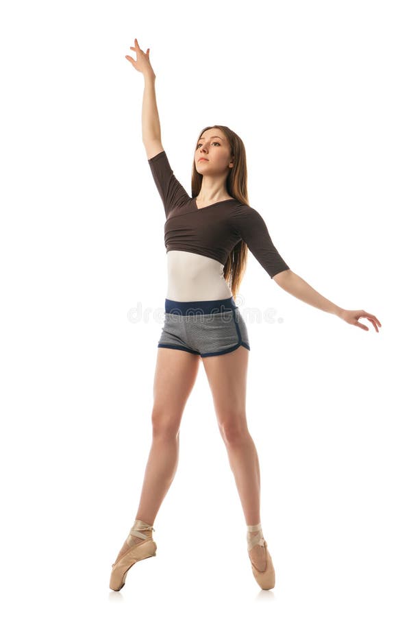 Dancer Posing En Pointe Looking at Camera Stock Photo - Image of ...