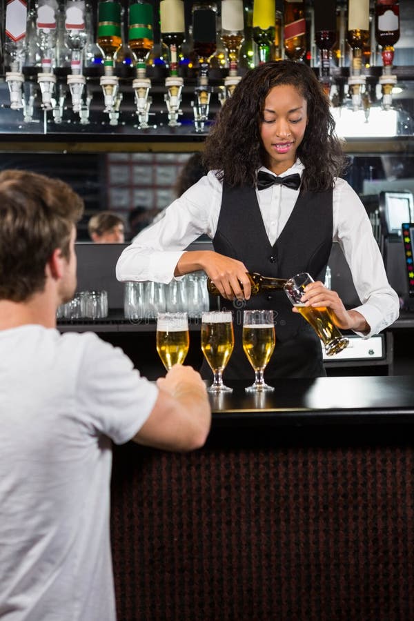 Beautiful Barmaid Serving Beer Stock Image - Image of expertise ...