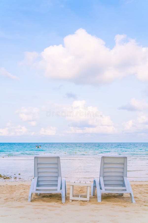 .Beautiful Beach Chairs on Tropical White Sand Beach Stock Image ...
