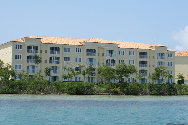 Beautiful beach condos stock photo. Image of housing - 14024714