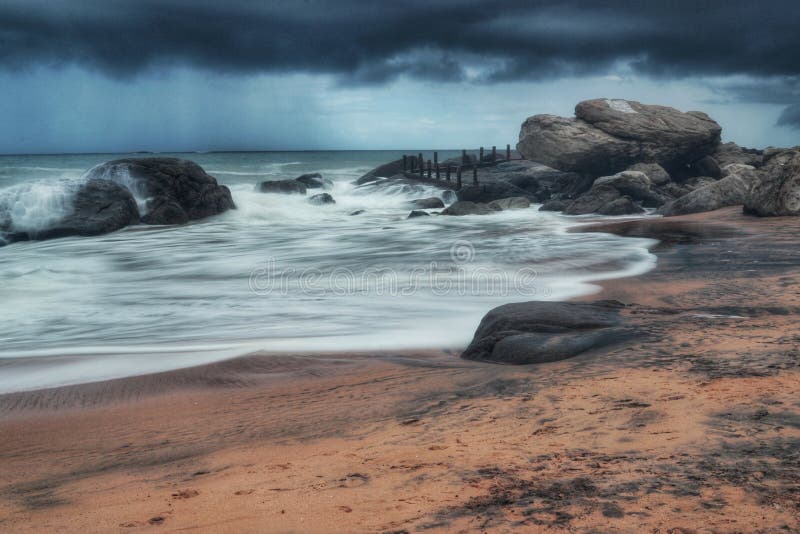 A Beautiful Beach and Dark Dramatic Sky Stock Image - Image of beach ...