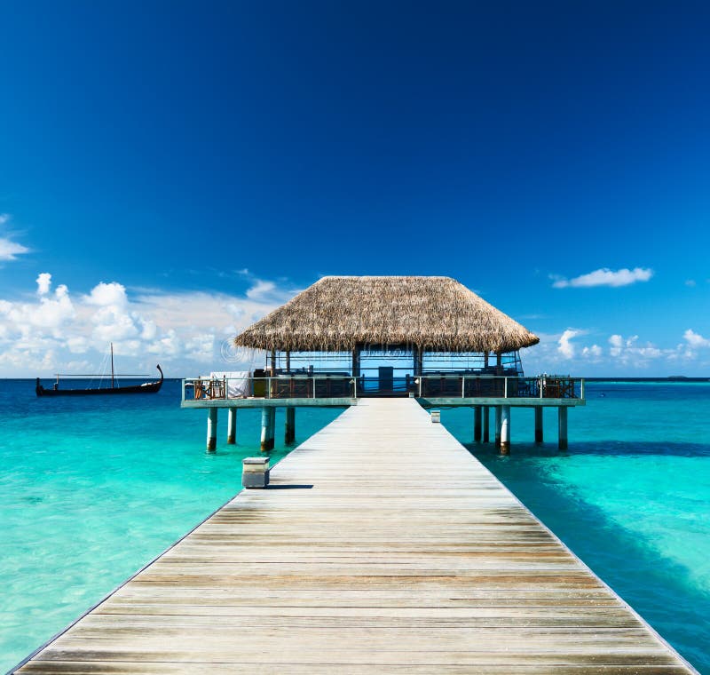 Beautiful beach with jetty stock photo. Image of beach - 29504992