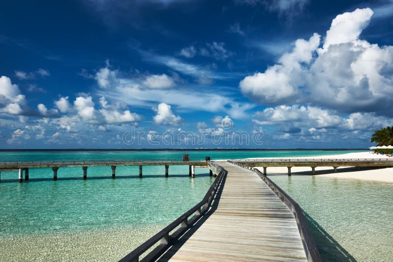 Beautiful beach with jetty stock image. Image of pier - 31872645