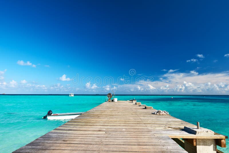 Beautiful beach with jetty stock photo. Image of indian - 32189204
