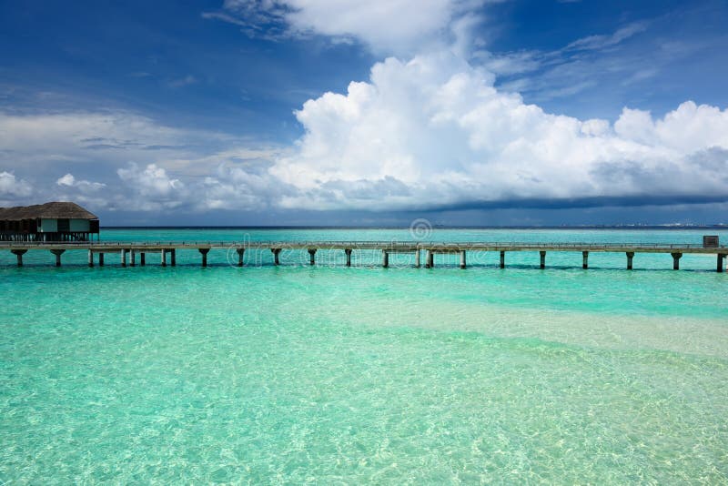 Beautiful beach with jetty stock photo. Image of nature - 32354884