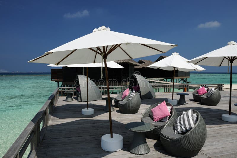 Beautiful beach with jetty stock photo. Image of pier - 67969526