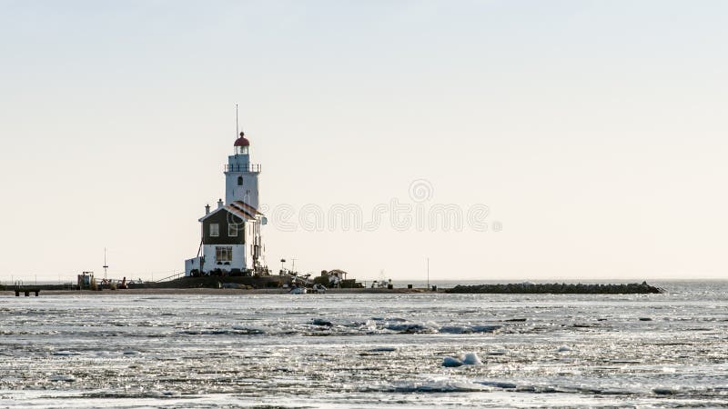 A Beautiful Beach and Lighthouse at Sunrise (Marken the Netherlands ...