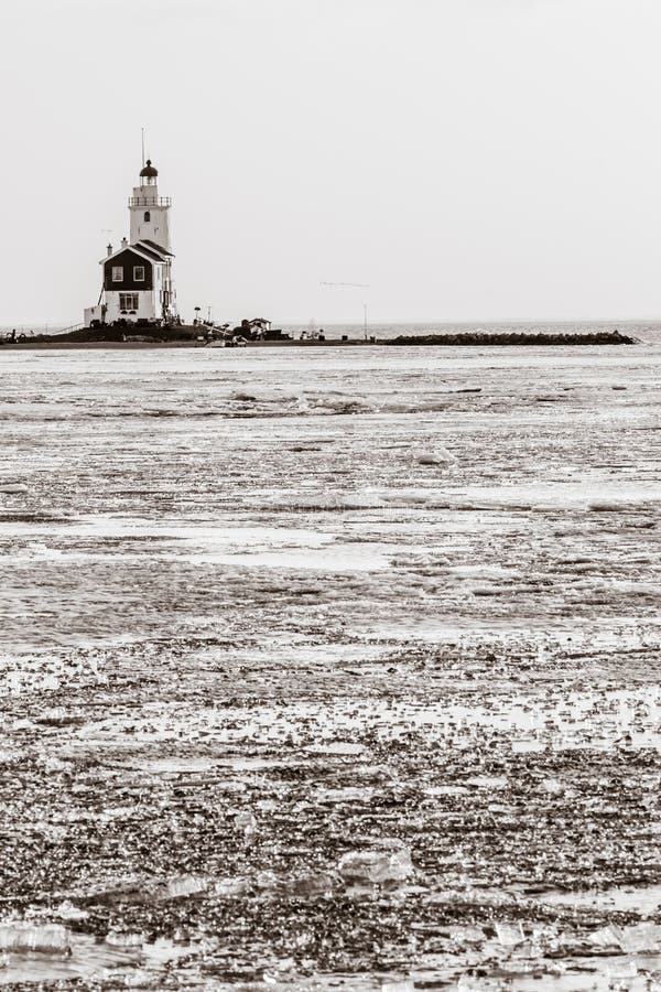 A Beautiful Beach and Lighthouse at Sunrise (Marken the Netherlands ...
