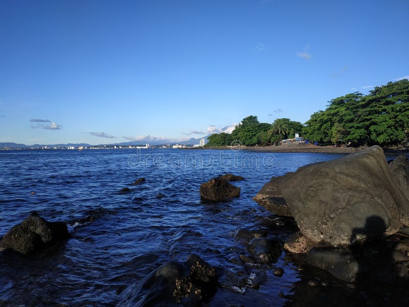 Beautiful beach in manado stock image. Image of cliff - 201994835