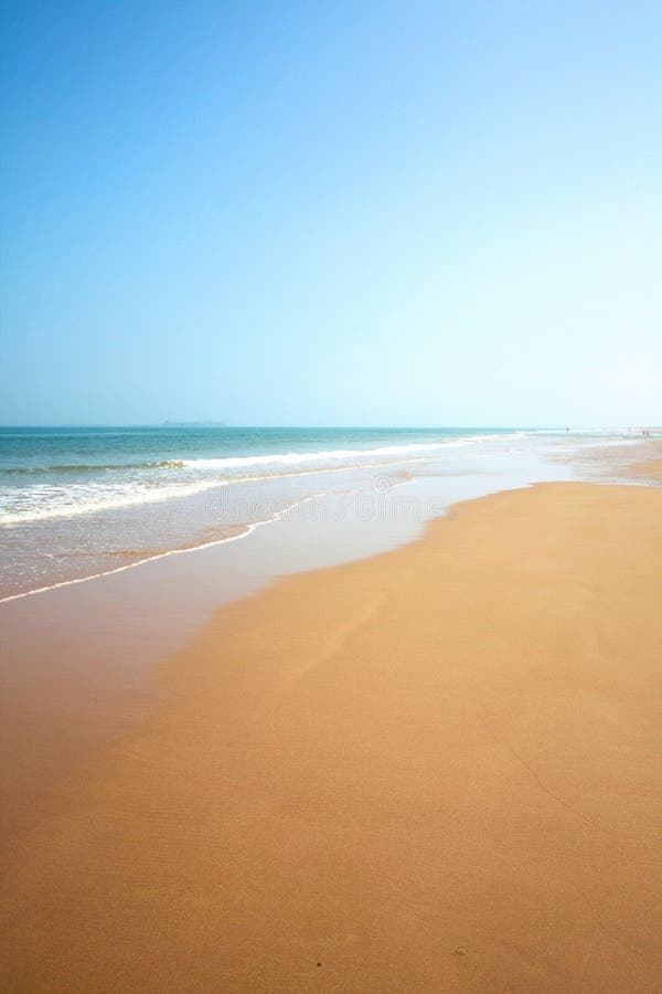 Beautiful Beach with Sand, Blue Waves and Sky Stock Photo - Image of ...