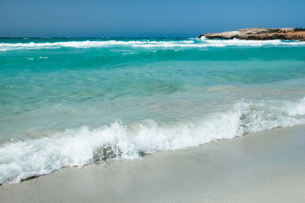 Beautiful Beach with Waves in the Nature of the Background Stock Photo ...