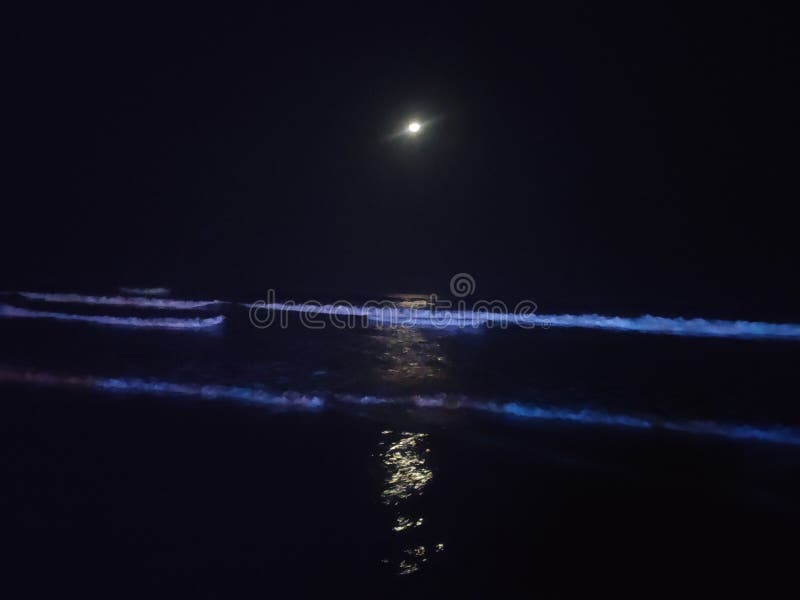 Moon and waves night beach stock photo. Image of nature - 267610108