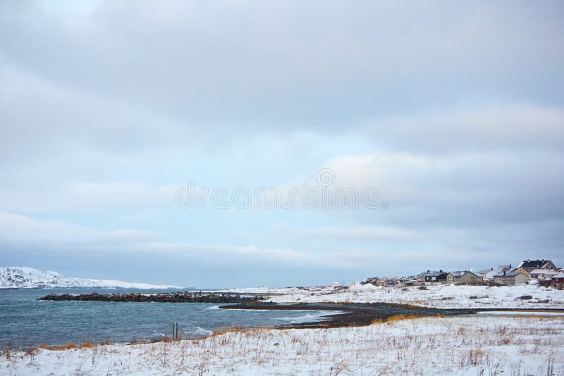 The Beautiful Beach in Winter with Snow and Clouds Stock Image - Image ...