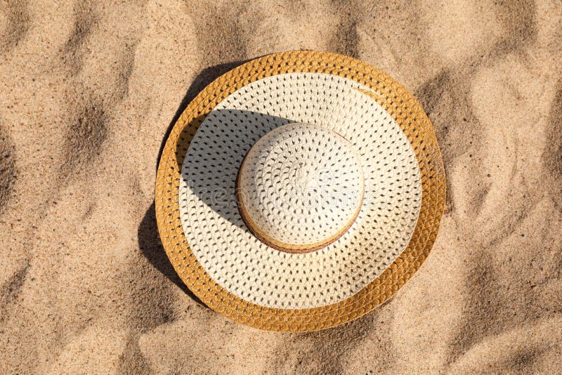 Beautiful Beige Straw Hat on Sand, Top View Stock Image - Image of ...