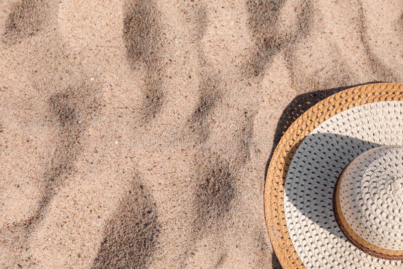 Beautiful Beige Straw Hat on Sand, Top View. Space for Text Stock Photo ...