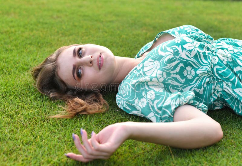 Beautiful Belarus Woman Laying on the Grass Stock Image - Image of ...
