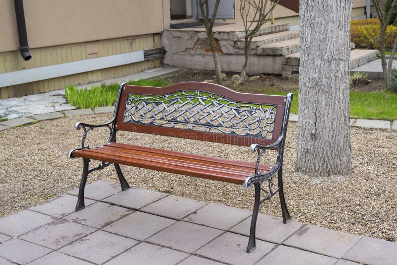 Beautiful Bench in Front of House Stock Image - Image of bench, road ...