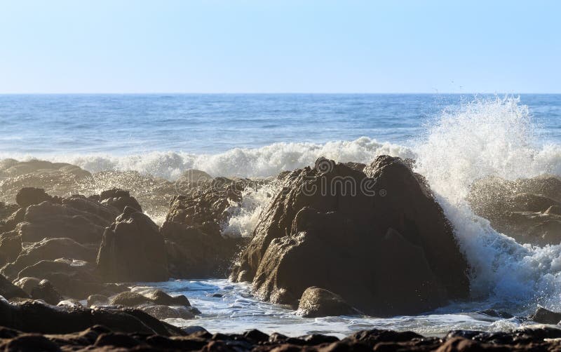 Beautiful Big Rock on Oceanic Beach with Big Waves and Water Splashes ...