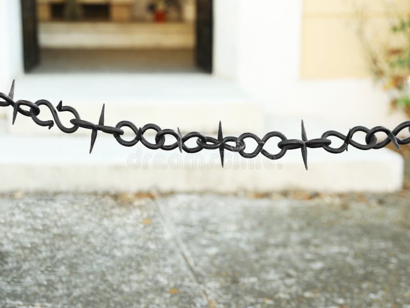 Beautiful Black Chain with Spikes Near Building Outdoors Stock Photo ...