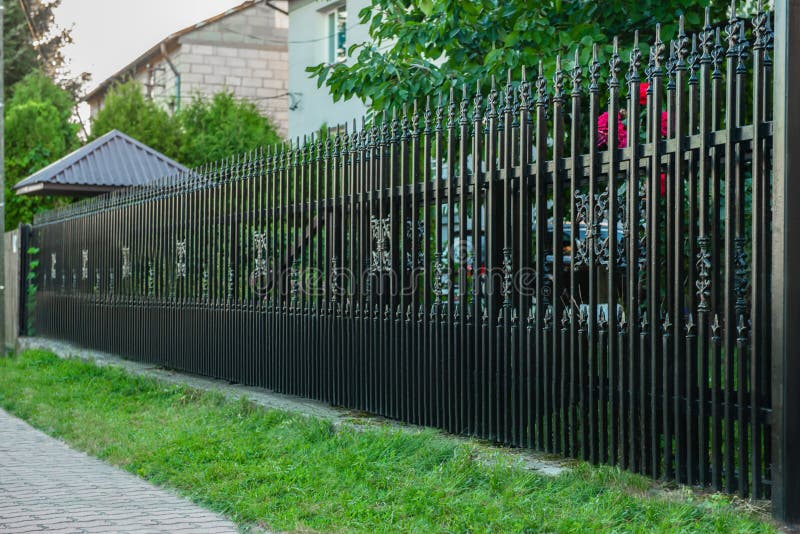 Beautiful Black Iron Fence Near Pathway Outdoors Stock Image - Image of ...