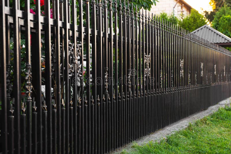 Beautiful Black Iron Fence Near Pathway Outdoors Stock Image - Image of ...