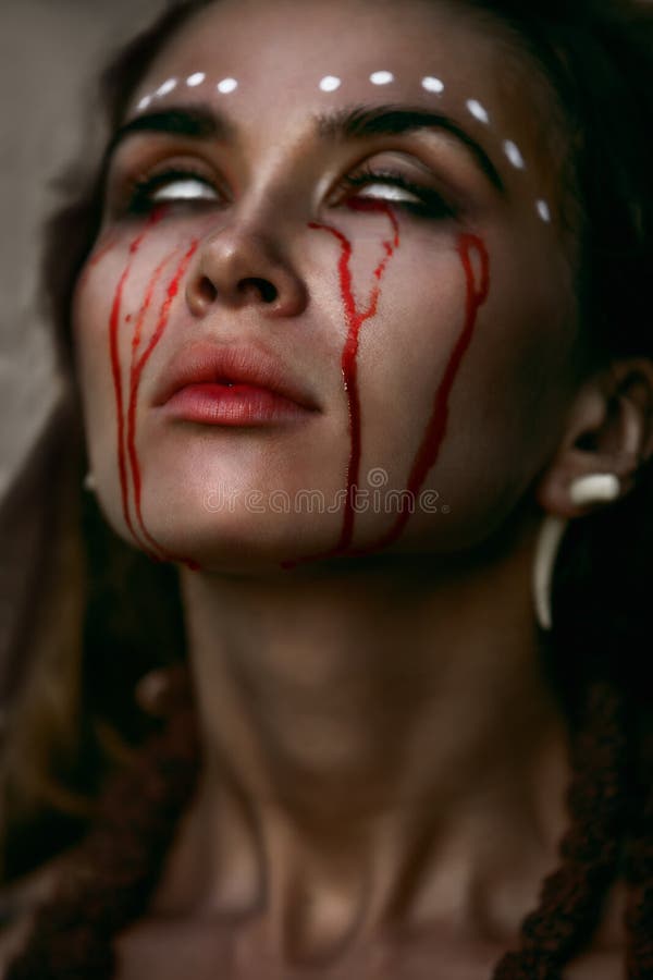 Beautiful bleeding witch, stock photo. Image of assault - 79415102