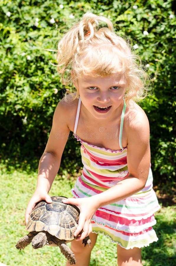 Beautiful Blond Girl with Turtle Stock Image - Image of child, smile ...