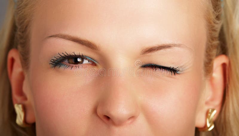 Young woman winking stock photo. Image of blond, youthful - 8364488